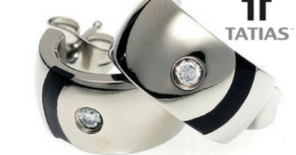 How should an allergy to a titanium earring be treated?